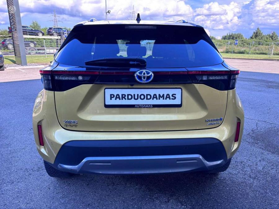Yellow Toyota Yaris Cross 2022 in Panevezys, with an engine capacity of 1.49 L and mileage of 111 thousand km for 22999 €, photo 9 on AUTOMOTO.COM.LV