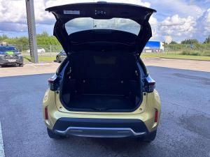 Yellow Toyota Yaris Cross 2022 in Panevezys, with an engine capacity of 1.49 L and mileage of 111 thousand km for 22999 €, photo 14 on AUTOMOTO.COM.LV