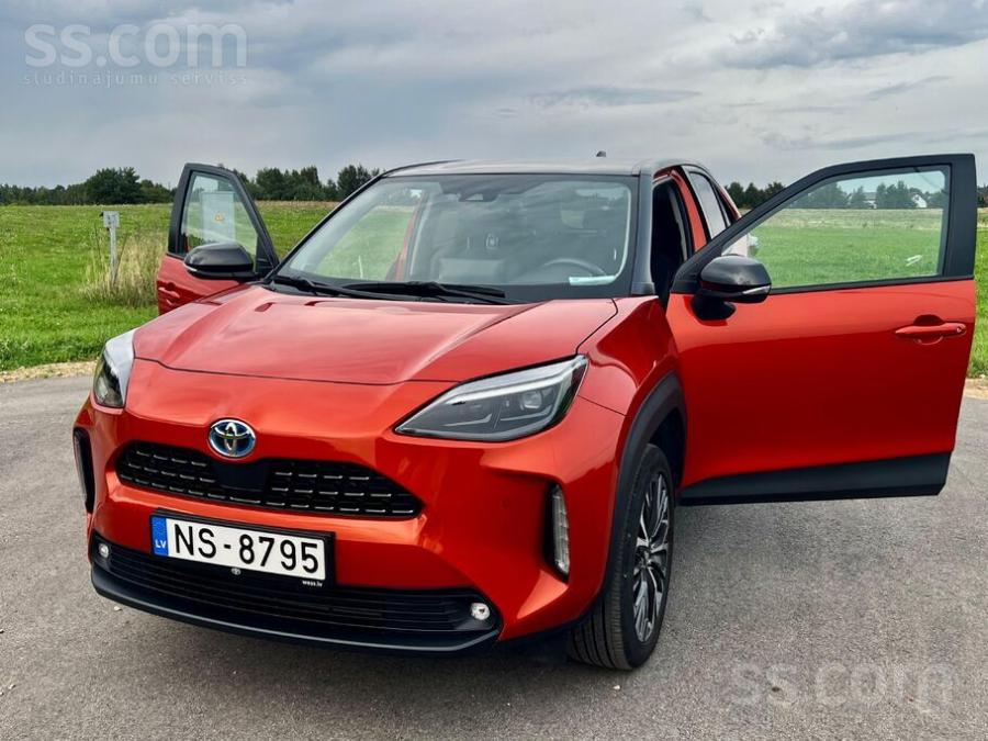 Orange Toyota Yaris 2023 in Riga, with an engine capacity of 1.50 L and mileage of 27 thousand km for 23200 €, photo 3 on AUTOMOTO.COM.LV
