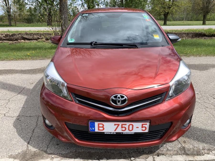 Sarkans Toyota Yaris 2013 Ogre, ar dzinēja tilpumu 1.30 L un nobraukumu 151 tūkst. km par 6590 €, foto 2 vietnē AUTOMOTO.COM.LV