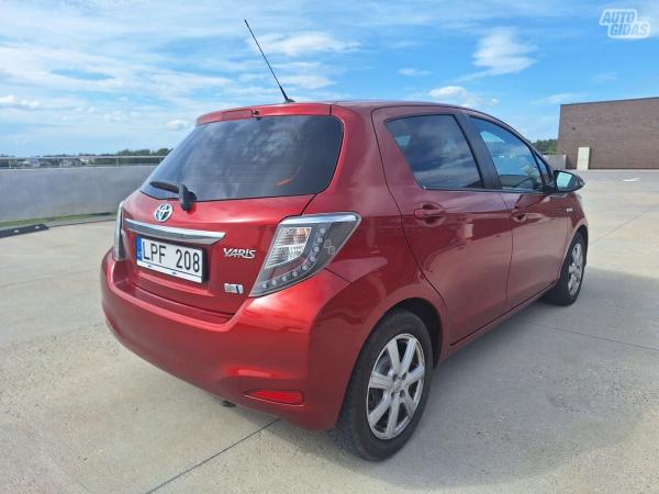 Red Toyota Yaris 2014 in Vilnius, with an engine capacity of 1.50 L and mileage of 72 thousand km for 8900 €, photo 2 on AUTOMOTO.COM.LV