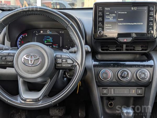 White Toyota Yaris 2023 in Valmiera, with an engine capacity of 1.50 L and mileage of 88 thousand km for 15500 €, photo 5 on AUTOMOTO.COM.LV