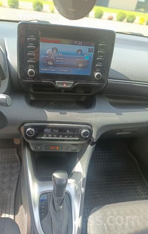White Toyota Yaris 2023 in Riga, with an engine capacity of 1.50 L and mileage of 65 thousand km for 13800 €, photo 14 on AUTOMOTO.COM.LV