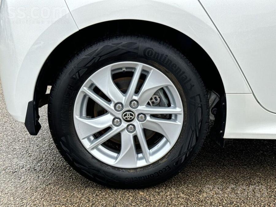 White Toyota Yaris 2023 in Riga, with an engine capacity of 1.50 L and mileage of 68 thousand km for 16590 €, photo 16 on AUTOMOTO.COM.LV