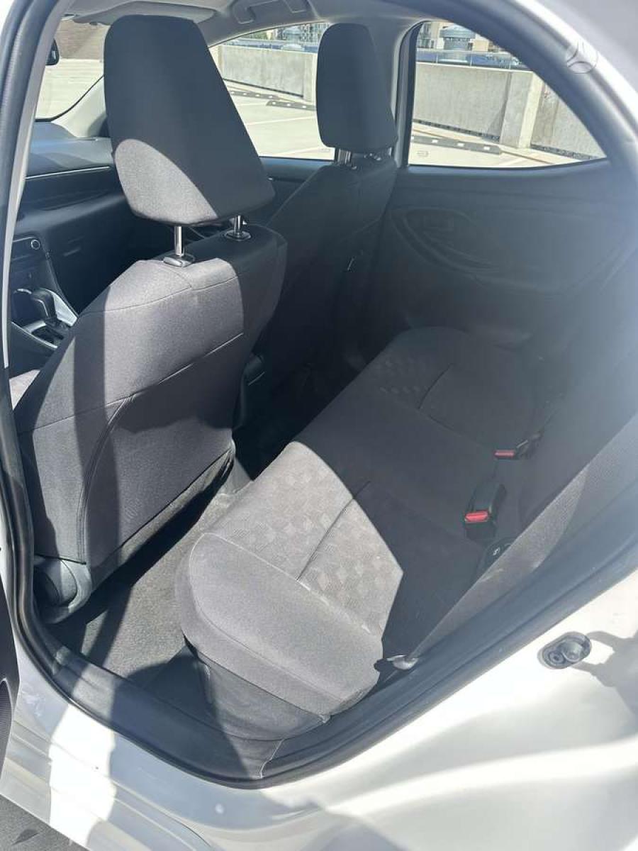 White Toyota Yaris 2025 in Vilnius, with an engine capacity of 1.49 L and mileage of 19 thousand km for 20500 €, photo 9 on AUTOMOTO.COM.LV