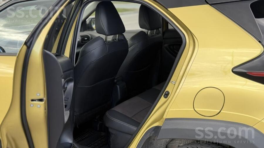Yellow Toyota Yaris 2021 in Riga, with an engine capacity of 1.50 L and mileage of 90 thousand km for 21300 €, photo 14 on AUTOMOTO.COM.LV