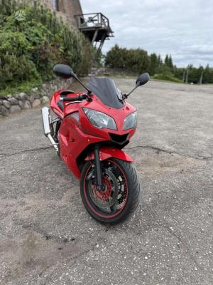 Red Triumph Daytona 2006 in Rokiskis, with an engine capacity of 0.60 L and mileage of 53 thousand km for 2500 €, photo  on AUTOMOTO.COM.LV