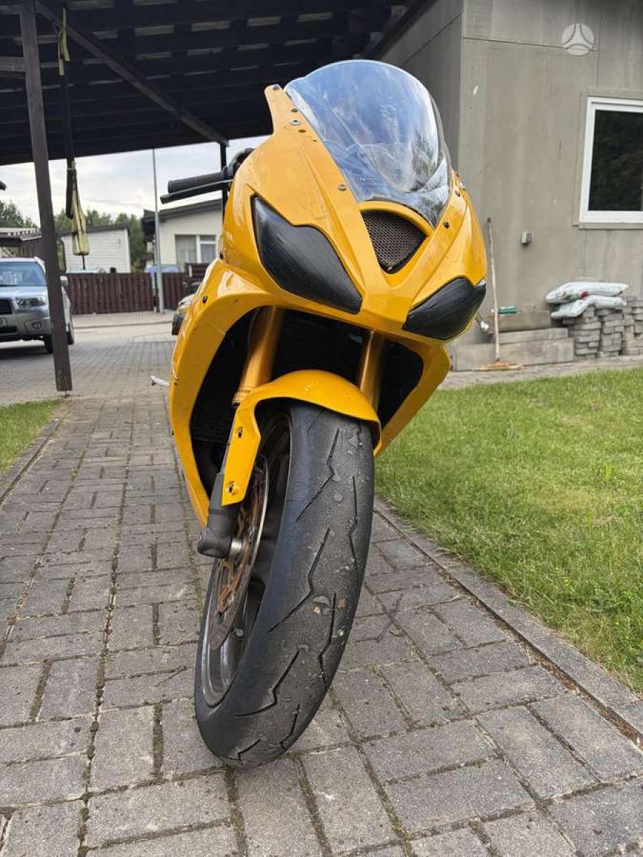 Dzeltens Triumph Daytona 2006 Viļņa, ar dzinēja tilpumu 0.68 L un nobraukumu 40 tūkst. km par 2300 €, foto 7 vietnē AUTOMOTO.COM.LV