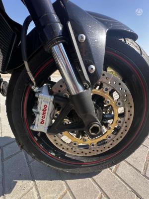 Black Triumph Speed Triple 2009 in Klaipeda, with an engine capacity of 1.05 L and mileage of 60 thousand km for 3700 €, photo 19 on AUTOMOTO.COM.LV