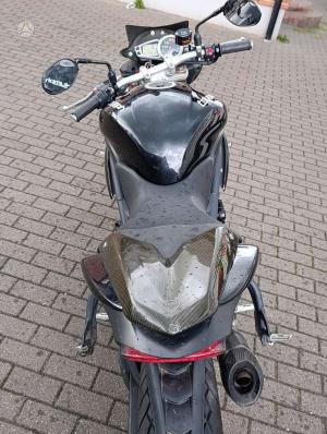 Black Triumph Speed Triple 2012 in Vievis, with an engine capacity of 1.05 L and mileage of 48 thousand km for 4300 €, photo 14 on AUTOMOTO.COM.LV