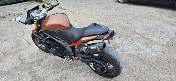 Yellow Triumph Speed Triple 2018 in Kaunas, with an engine capacity of 1.05 L and mileage of 60 thousand km for 3350 €, photo 6 on AUTOMOTO.COM.LV