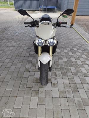 White Triumph Street Triple 2008 in Druskininkai, with an engine capacity of 0.00 L and mileage of 64 thousand km for 2500 €, photo 11 on AUTOMOTO.COM.LV