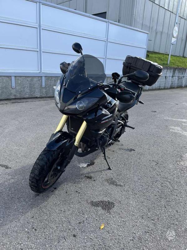 Black Triumph Tiger 2013 in Alytus, with an engine capacity of 1.05 L and mileage of 64 thousand km for 4000 €, photo 7 on AUTOMOTO.COM.LV