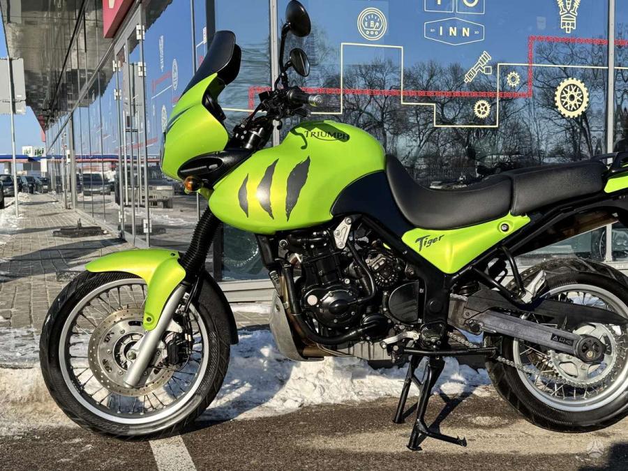 Zaļš Triumph Tiger 2000 Viļņa, ar dzinēja tilpumu 0.90 L un nobraukumu 48 tūkst. km par 2299 €, foto 12 vietnē AUTOMOTO.COM.LV