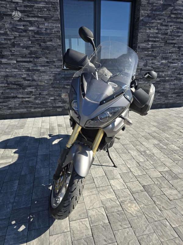 Grey Triumph Tiger 2010 in Taurage, with an engine capacity of 1.05 L and mileage of 57 thousand km for 3500 €, photo 2 on AUTOMOTO.COM.LV