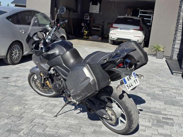 Grey Triumph Tiger 2010 in Taurage, with an engine capacity of 1.05 L and mileage of 57 thousand km for 3500 €, photo 4 on AUTOMOTO.COM.LV