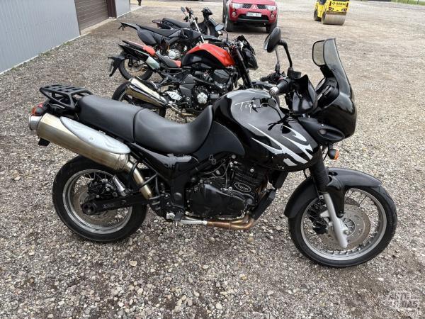 Triumph Tiger 1999 Kelmė vietnē Triumph Tiger 1999 Kelmė, ar dzinēja tilpumu 0.96 L un nobraukumu 52 tūkst. km par 1230 €, foto 3 vietnē AUTOMOTO.COM.LV