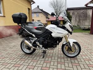 Triumph Tiger 2009 Tauragė, ar dzinēja tilpumu 1.05 L un nobraukumu 98 tūkst. km par 3100 €, foto  vietnē AUTOMOTO.COM.LV