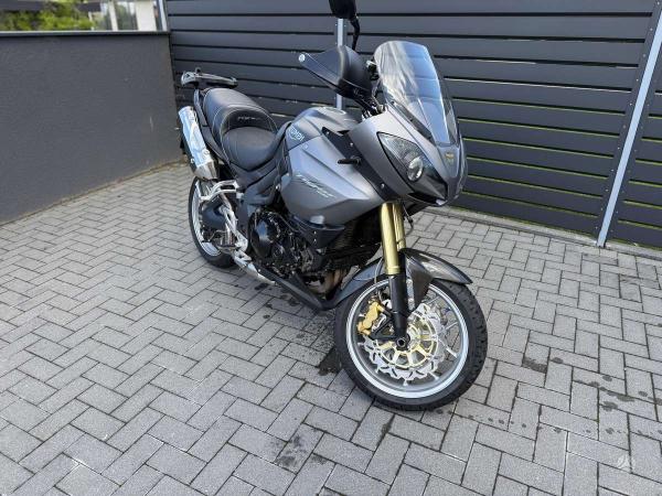 Triumph Tiger 2010 Plungė, ar dzinēja tilpumu 1.05 L un nobraukumu 58 tūkst. km par 3200 €, foto 1 vietnē AUTOMOTO.COM.LV