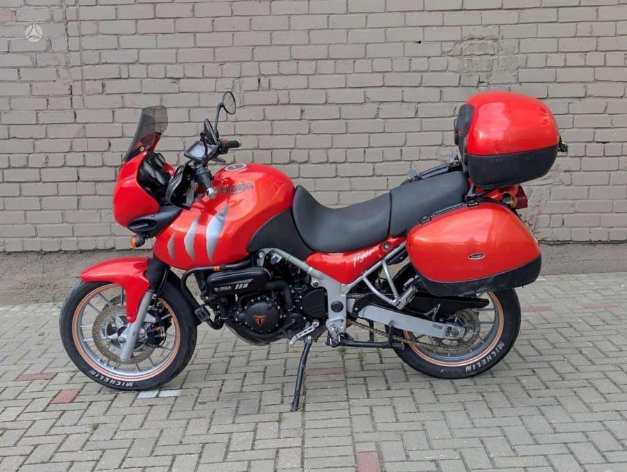 Oranžs Triumph Tiger 2005 Kauņa, ar dzinēja tilpumu 0.96 L un nobraukumu 34 tūkst. km par 2300 €, foto 1 vietnē AUTOMOTO.COM.LV