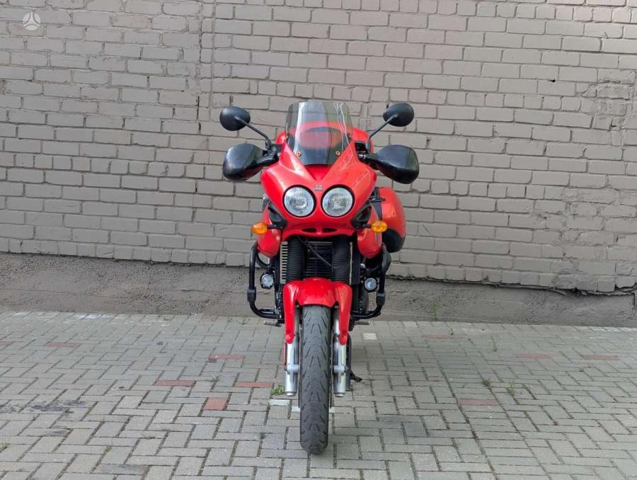 Oranžs Triumph Tiger 2005 Kauņa, ar dzinēja tilpumu 0.96 L un nobraukumu 34 tūkst. km par 2300 €, foto 3 vietnē AUTOMOTO.COM.LV