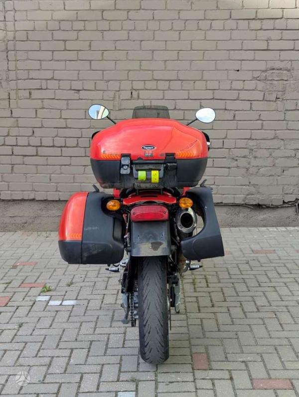 Orange Triumph Tiger 2005 in Kaunas, with an engine capacity of 0.96 L and mileage of 34 thousand km for 2300 €, photo 6 on AUTOMOTO.COM.LV