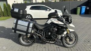 Balts Triumph Tiger 2013 Viļņa, ar dzinēja tilpumu 0.80 L un nobraukumu 68 tūkst. km par 4900 €, foto  vietnē AUTOMOTO.COM.LV