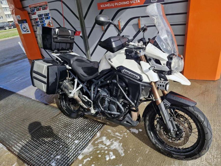 White Triumph Tiger 2014 in Kaisiadorys, with an engine capacity of 1.22 L and mileage of 96 thousand km for 6450 €, photo 1 on AUTOMOTO.COM.LV