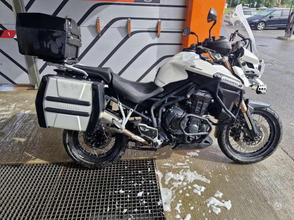 White Triumph Tiger 2014 in Kaisiadorys, with an engine capacity of 1.22 L and mileage of 96 thousand km for 6450 €, photo 2 on AUTOMOTO.COM.LV