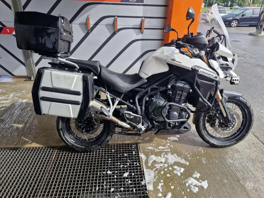 White Triumph Tiger 2014 in Kaisiadorys, with an engine capacity of 1.22 L and mileage of 96 thousand km for 6450 €, photo 3 on AUTOMOTO.COM.LV