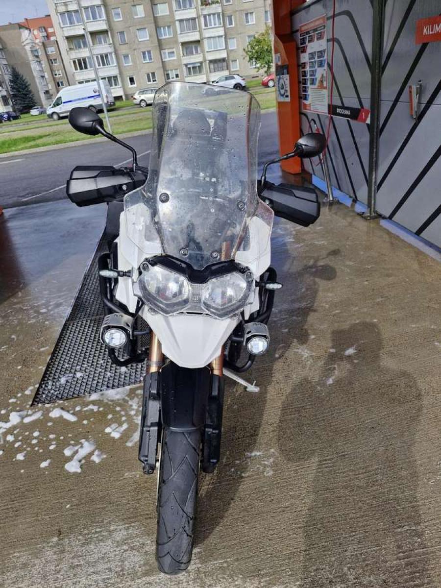 White Triumph Tiger 2014 in Kaisiadorys, with an engine capacity of 1.22 L and mileage of 96 thousand km for 6450 €, photo 4 on AUTOMOTO.COM.LV
