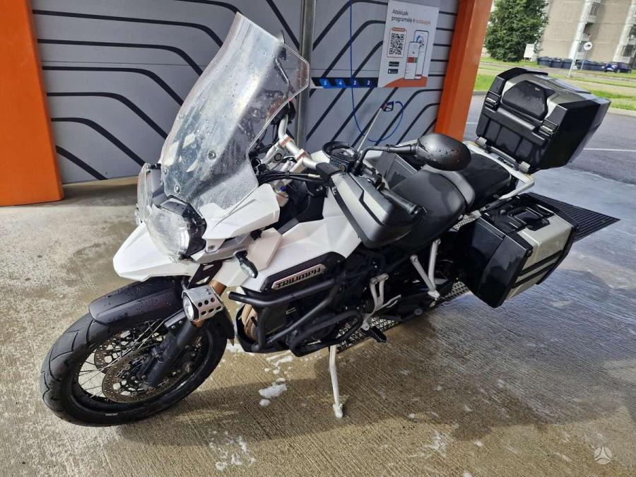 White Triumph Tiger 2014 in Kaisiadorys, with an engine capacity of 1.22 L and mileage of 96 thousand km for 6450 €, photo 5 on AUTOMOTO.COM.LV