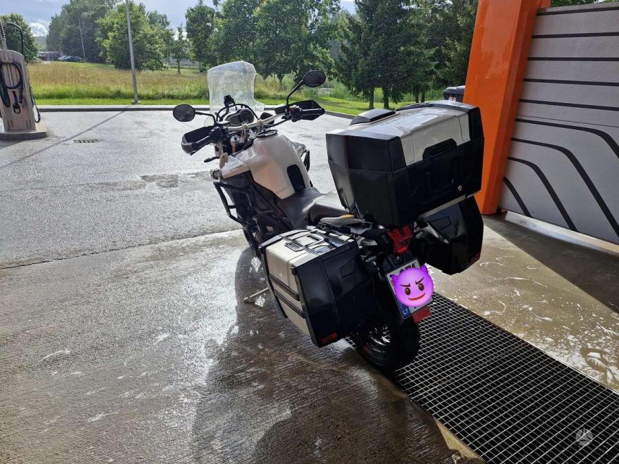 White Triumph Tiger 2014 in Kaisiadorys, with an engine capacity of 1.22 L and mileage of 96 thousand km for 6450 €, photo 9 on AUTOMOTO.COM.LV