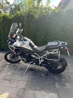 White Triumph Tiger 2023 in Mazeikiai, with an engine capacity of 1.16 L and mileage of 27 thousand km for 11495 €, photo  on AUTOMOTO.COM.LV