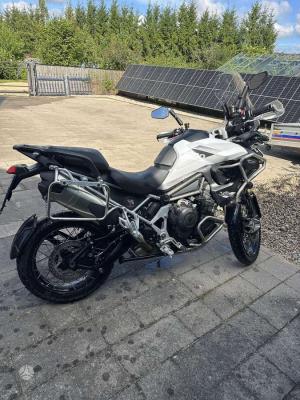 White Triumph Tiger 2023 in Mazeikiai, with an engine capacity of 1.16 L and mileage of 27 thousand km for 11495 €, photo 5 on AUTOMOTO.COM.LV