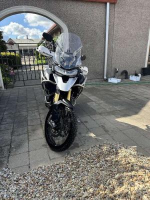 White Triumph Tiger 2023 in Mazeikiai, with an engine capacity of 1.16 L and mileage of 27 thousand km for 11495 €, photo 7 on AUTOMOTO.COM.LV