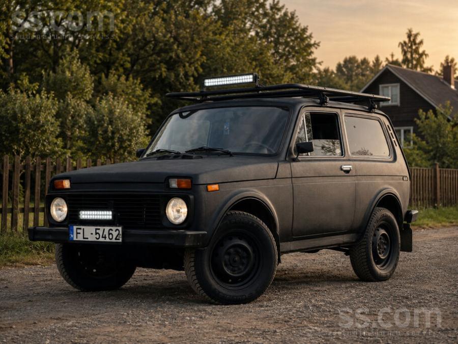 Melns VAZ / Lada 2121 Niva 2005 Rīga, ar dzinēja tilpumu 1.70 L un nobraukumu 143 tūkst. km par 3000 €, foto 1 vietnē AUTOMOTO.COM.LV