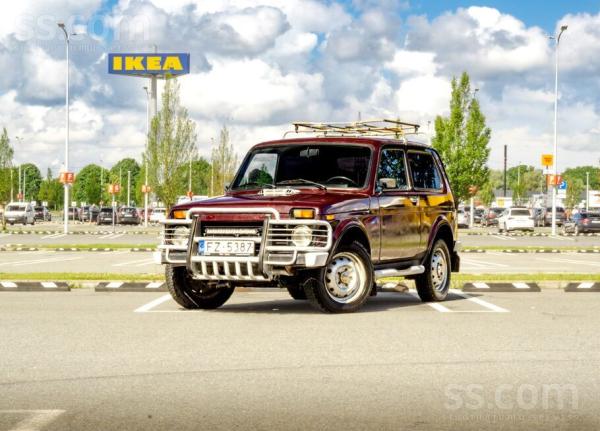 Sarkans VAZ / Lada 2121 Niva 2006 Rīga, ar dzinēja tilpumu 1.70 L un nobraukumu 137 tūkst. km par 2690 €, foto 1 vietnē AUTOMOTO.COM.LV