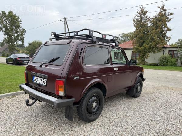 Violet VAZ / Lada 2121 Niva 2011 in Ventspils, with an engine capacity of 1.70 L and mileage of 28 thousand km for 7990 €, photo 5 on AUTOMOTO.COM.LV