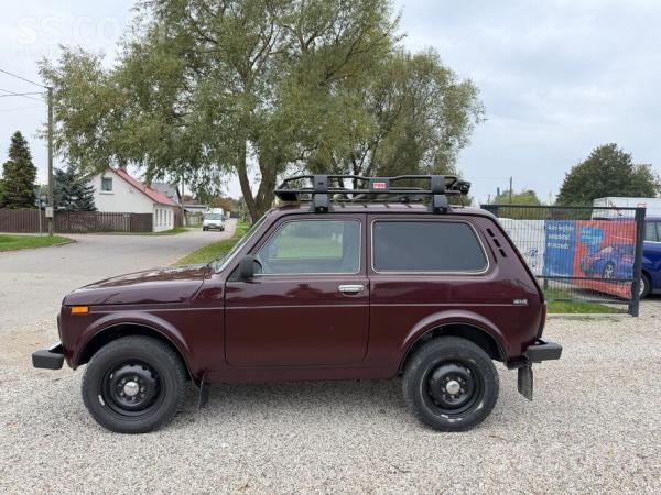 Violet VAZ / Lada 2121 Niva 2011 in Ventspils, with an engine capacity of 1.70 L and mileage of 28 thousand km for 7990 €, photo 8 on AUTOMOTO.COM.LV