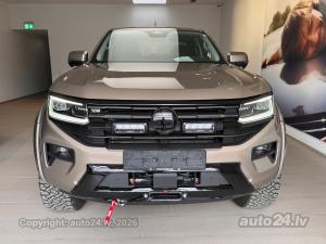 Smilšu krāsa Volkswagen Amarok 2026 Viljandi, ar dzinēja tilpumu 3.00 L un nobraukumu 10 tūkst. km par 69990 €, foto  vietnē AUTOMOTO.COM.LV