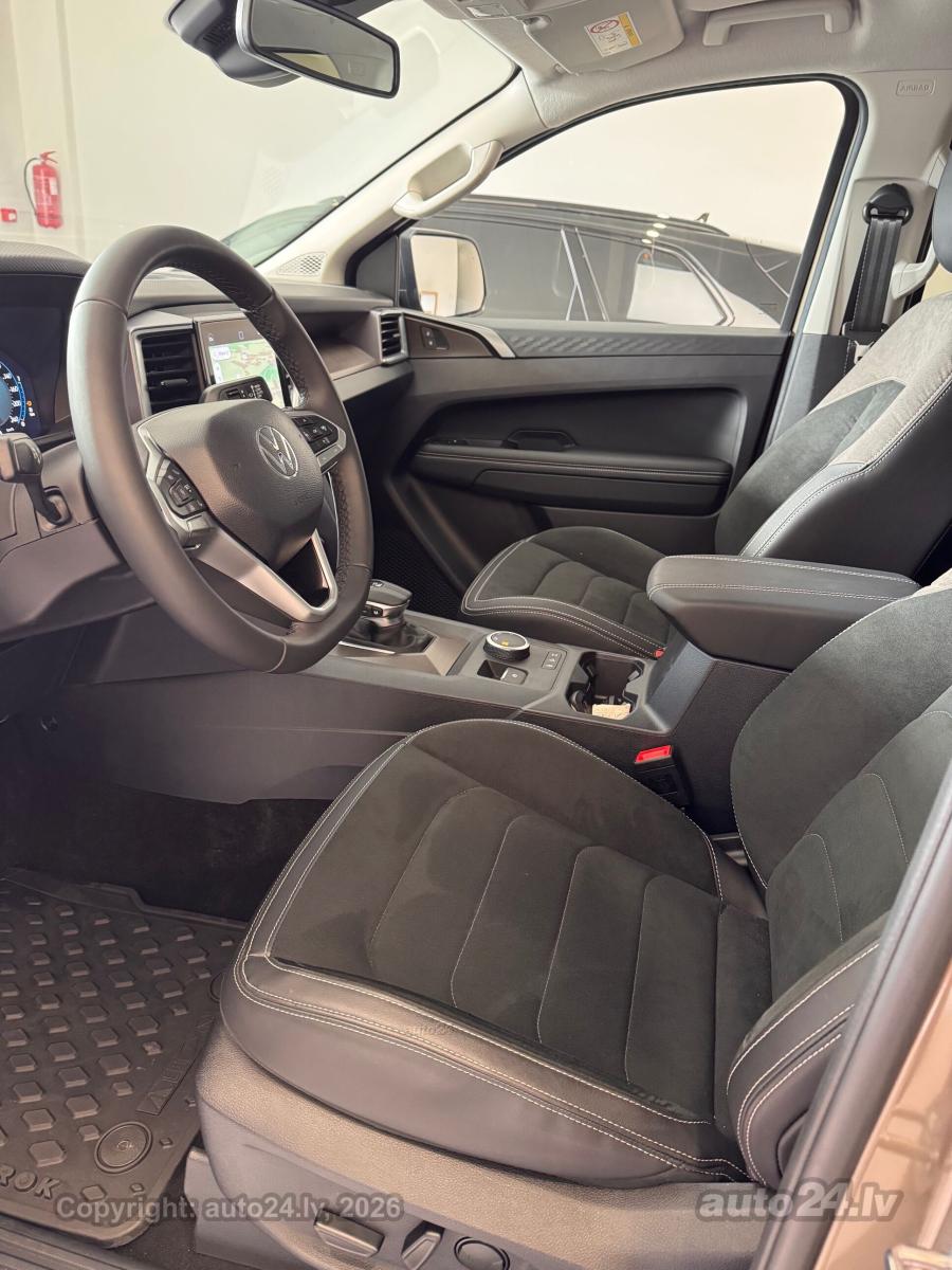 Smilšu krāsa Volkswagen Amarok 2026 Viljandi, ar dzinēja tilpumu 3.00 L un nobraukumu 10 tūkst. km par 69990 €, foto 7 vietnē AUTOMOTO.COM.LV
