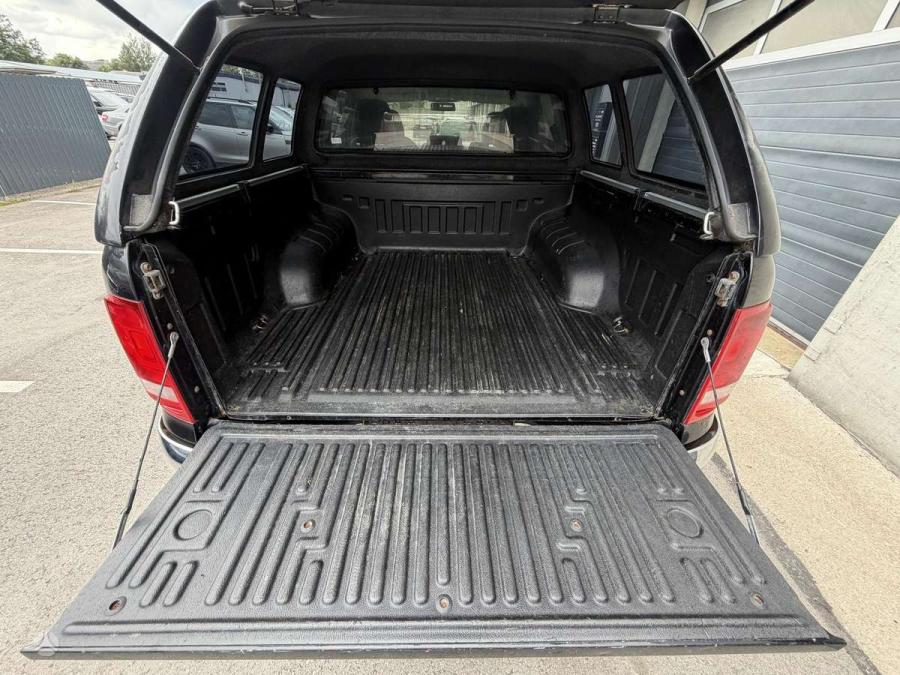 Melns Volkswagen Amarok 2010 Šauļi, ar dzinēja tilpumu 2.00 L un nobraukumu 250 tūkst. km par 7800 €, foto 8 vietnē AUTOMOTO.COM.LV