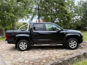 Black Volkswagen Amarok 2012 in Saldus, with an engine capacity of 2.00 L and mileage of 212 thousand km for 11450 €, photo 3 on AUTOMOTO.COM.LV