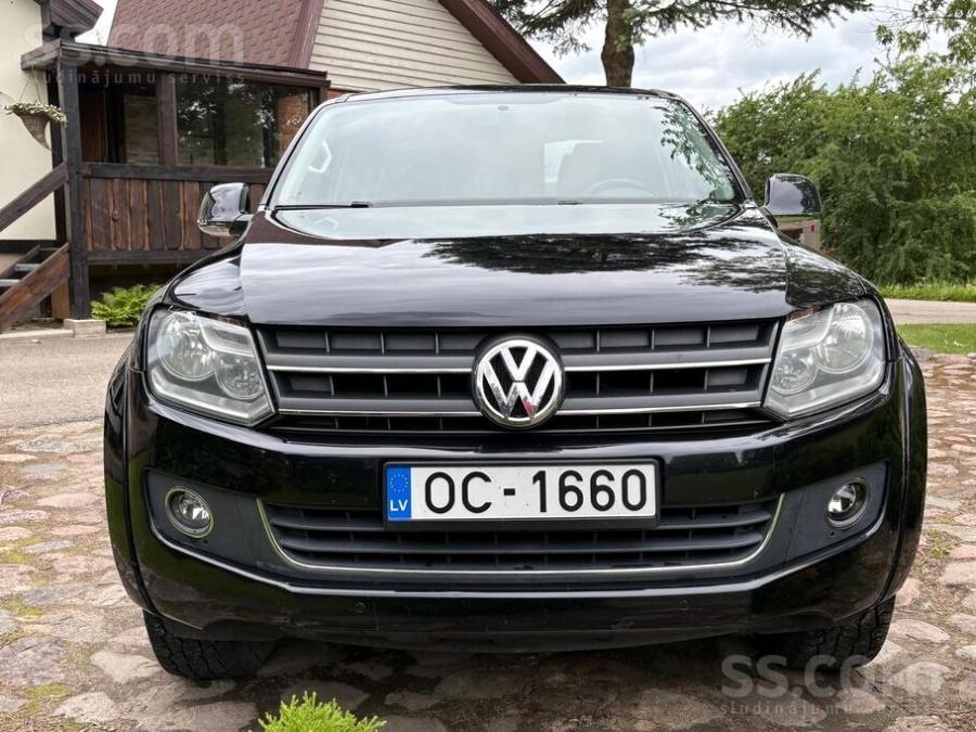 Black Volkswagen Amarok 2012 in Saldus, with an engine capacity of 2.00 L and mileage of 212 thousand km for 11450 €, photo 9 on AUTOMOTO.COM.LV