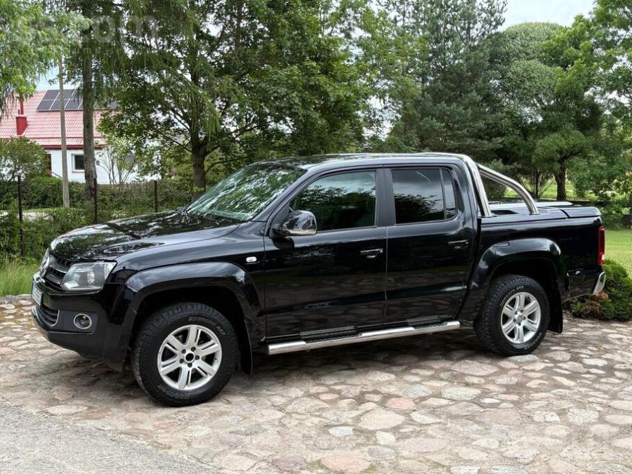 Black Volkswagen Amarok 2012 in Saldus, with an engine capacity of 2.00 L and mileage of 212 thousand km for 11450 €, photo 11 on AUTOMOTO.COM.LV