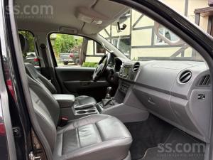Black Volkswagen Amarok 2012 in Saldus, with an engine capacity of 2.00 L and mileage of 212 thousand km for 11450 €, photo 13 on AUTOMOTO.COM.LV