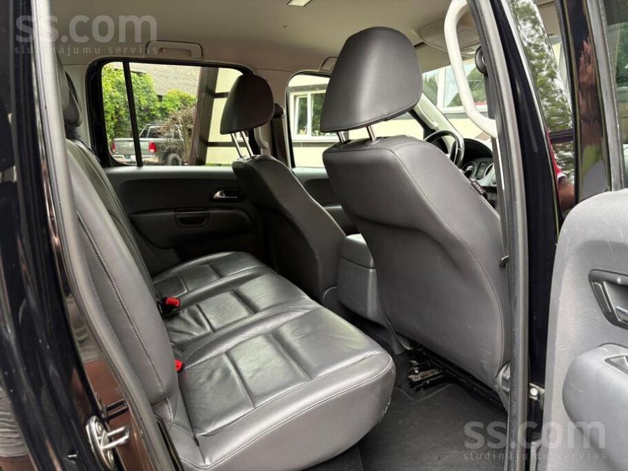 Black Volkswagen Amarok 2012 in Saldus, with an engine capacity of 2.00 L and mileage of 212 thousand km for 11450 €, photo 14 on AUTOMOTO.COM.LV