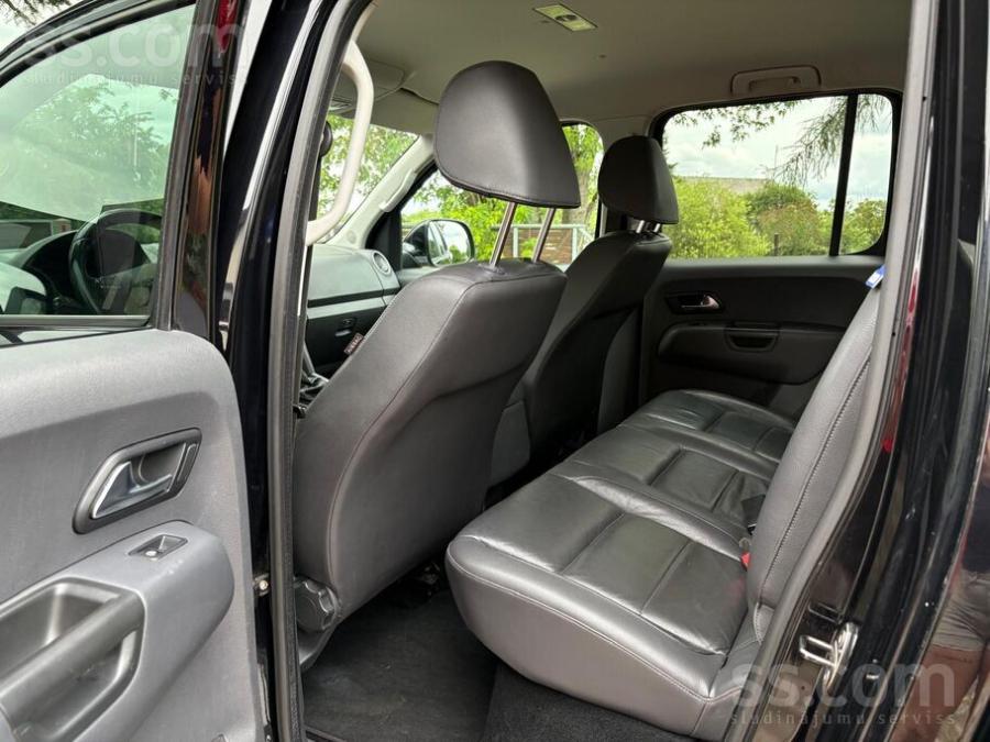 Black Volkswagen Amarok 2012 in Saldus, with an engine capacity of 2.00 L and mileage of 212 thousand km for 11450 €, photo 15 on AUTOMOTO.COM.LV