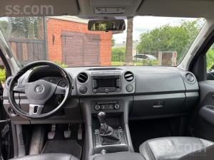 Black Volkswagen Amarok 2012 in Saldus, with an engine capacity of 2.00 L and mileage of 212 thousand km for 11450 €, photo 16 on AUTOMOTO.COM.LV